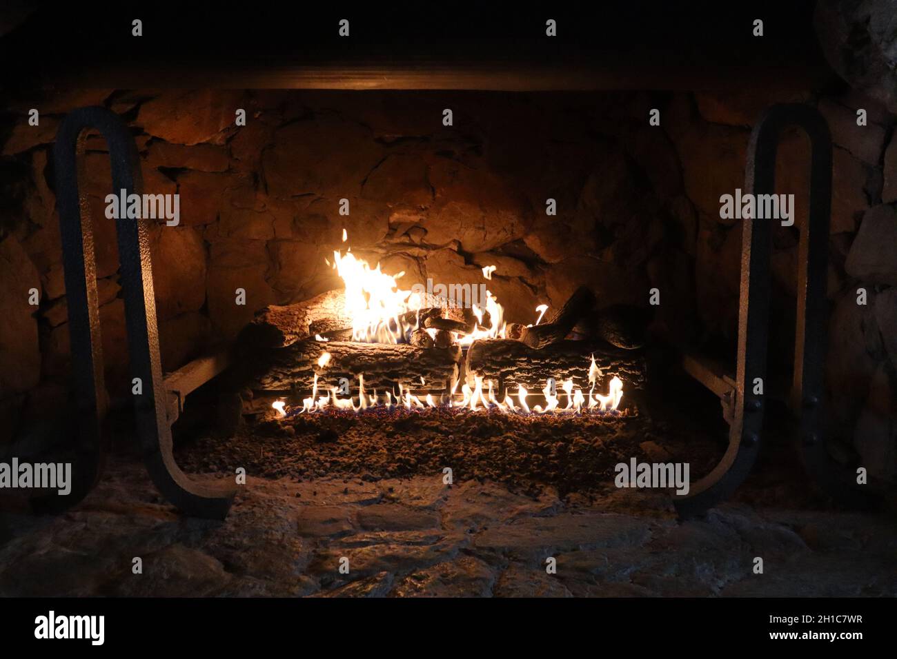 Fire burning in the fireplace Stock Photo - Alamy