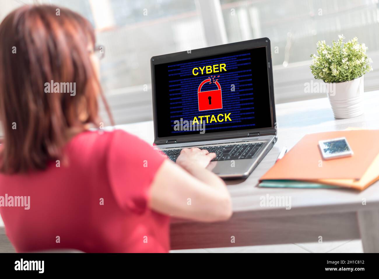 Laptop screen displaying a cyber attack concept Stock Photo - Alamy