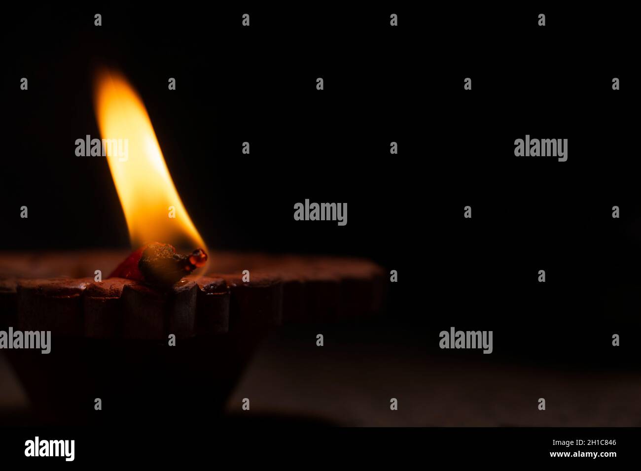Burning earthen lamp hi-res stock photography and images - Alamy