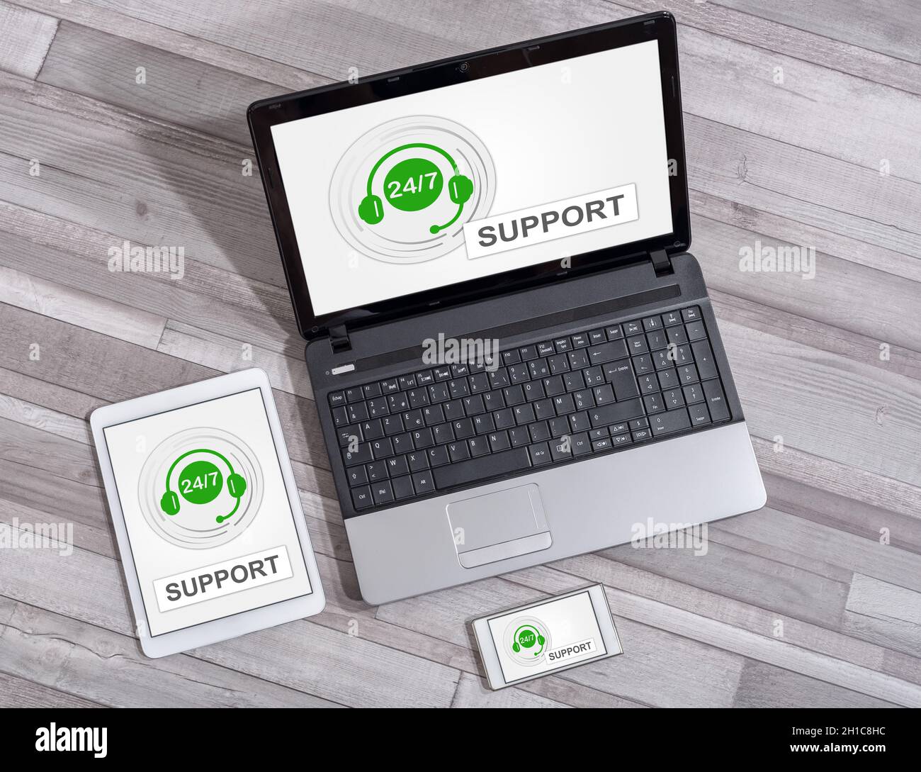 Support concept shown on different information technology devices Stock ...