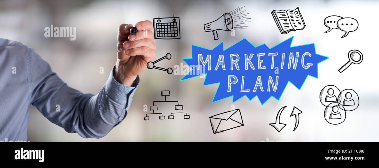 Man drawing a marketing plan concept Stock Photo - Alamy