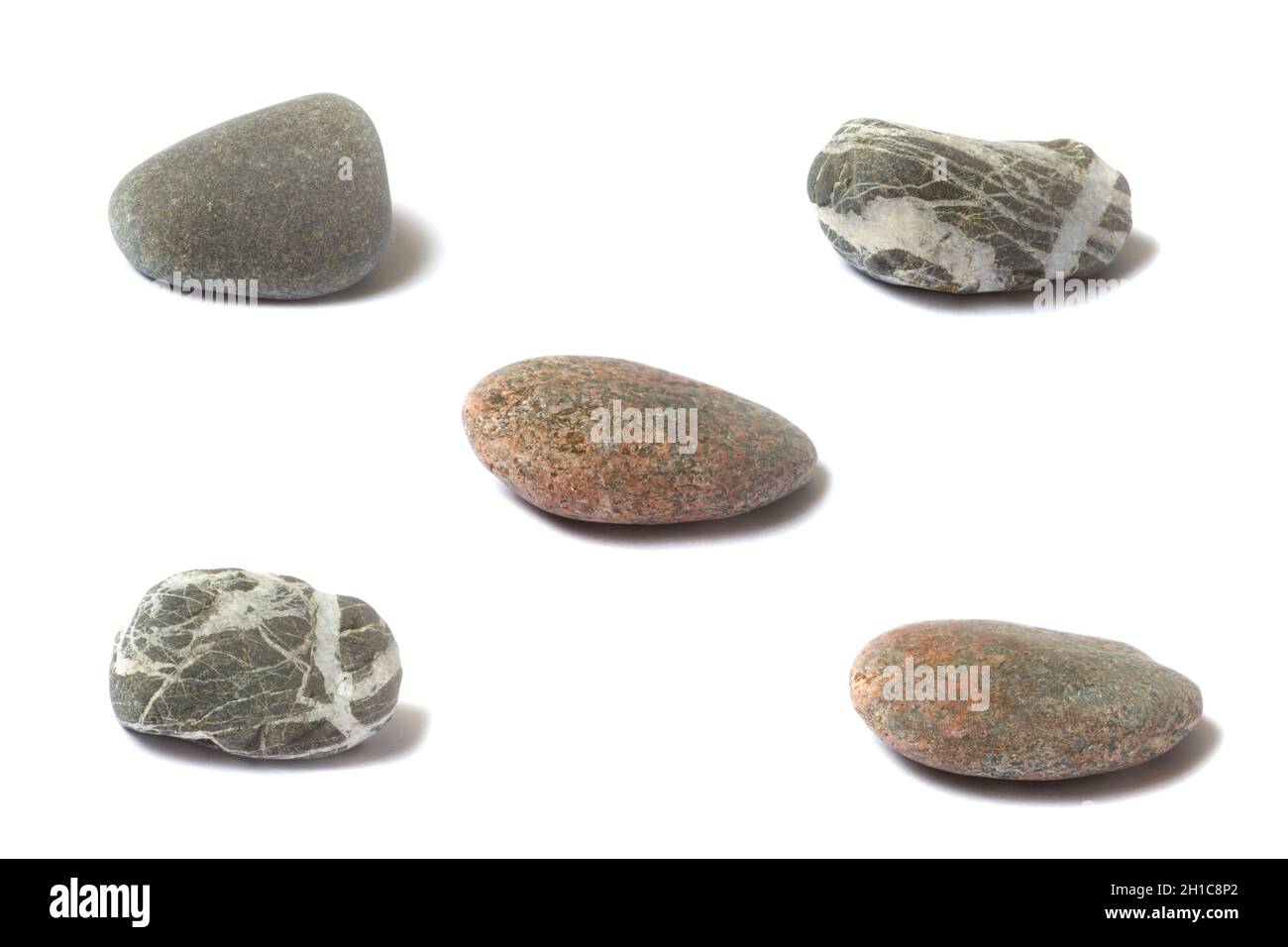 a set of stones with a shadow isolated on a white background. High ...