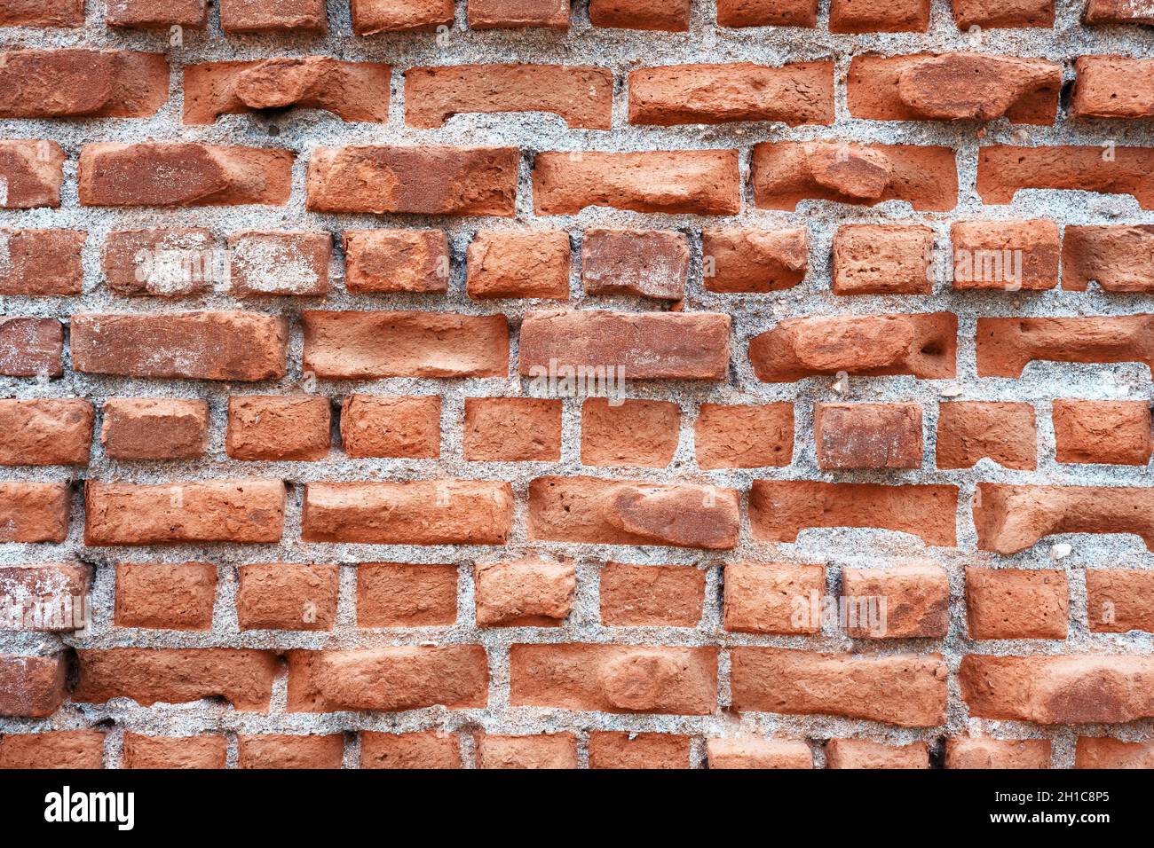 Red brick wall exterior background texture Stock Photo - Alamy