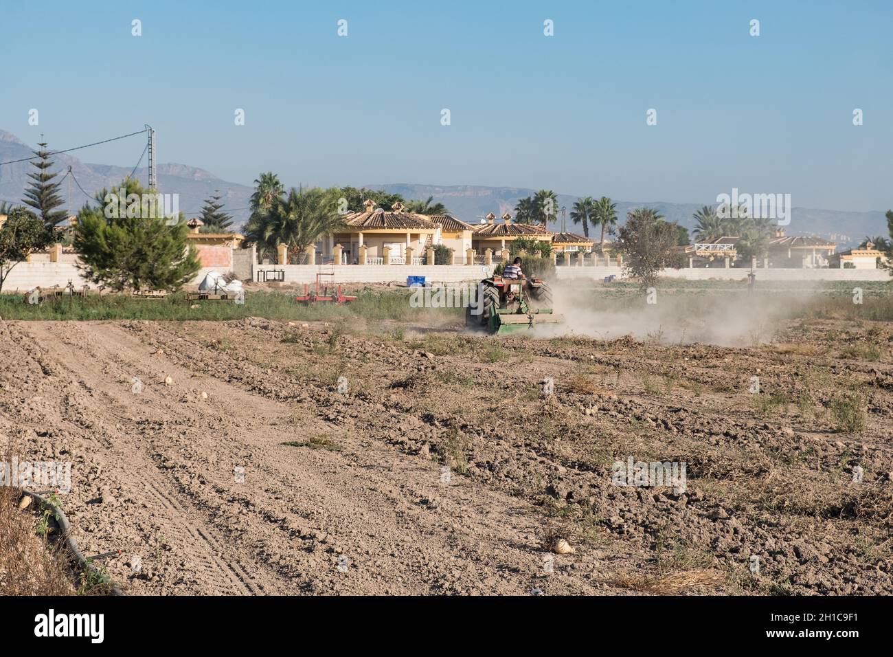 Young farmer man tilling hi-res stock photography and images - Alamy