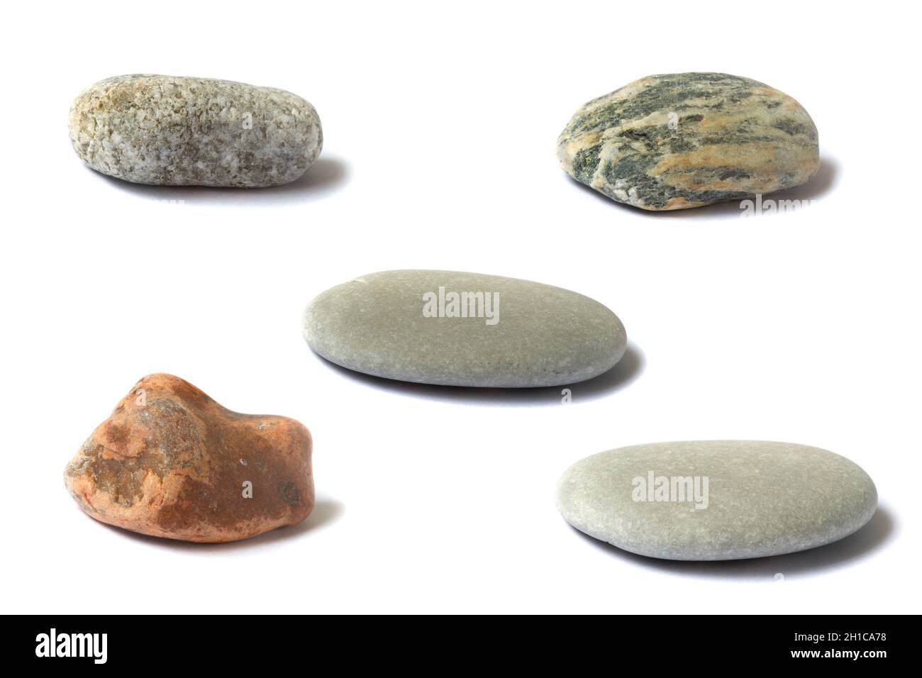 a set of stones with a shadow isolated on a white background. High ...