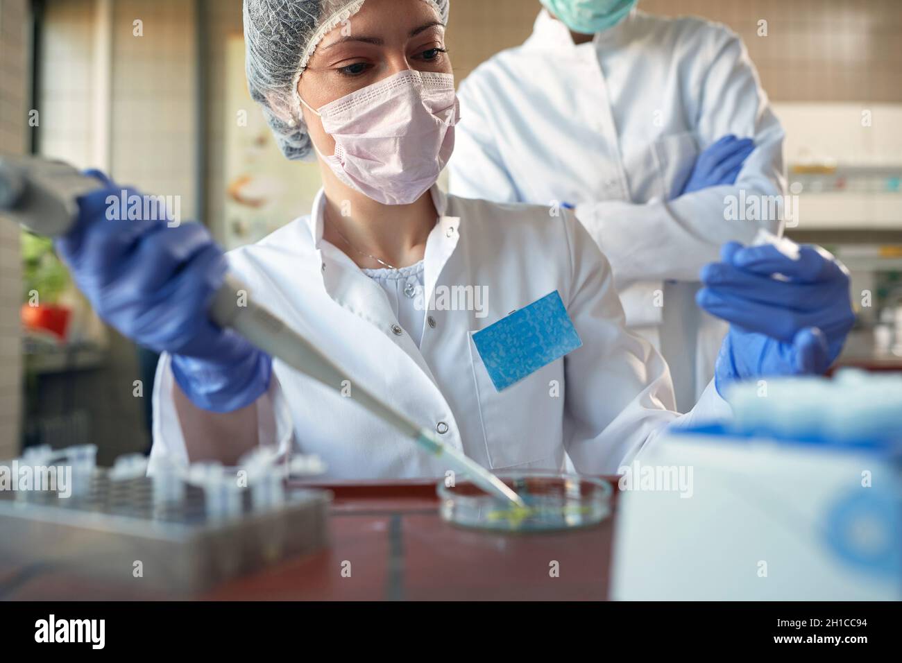 Medical worker in lab at workplace Stock Photo - Alamy