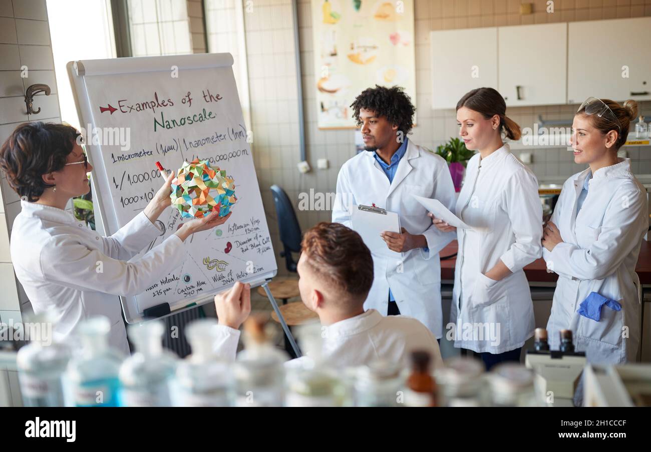 Young chemical students enjoy a lecture in a relaxed atmosphere in the ...