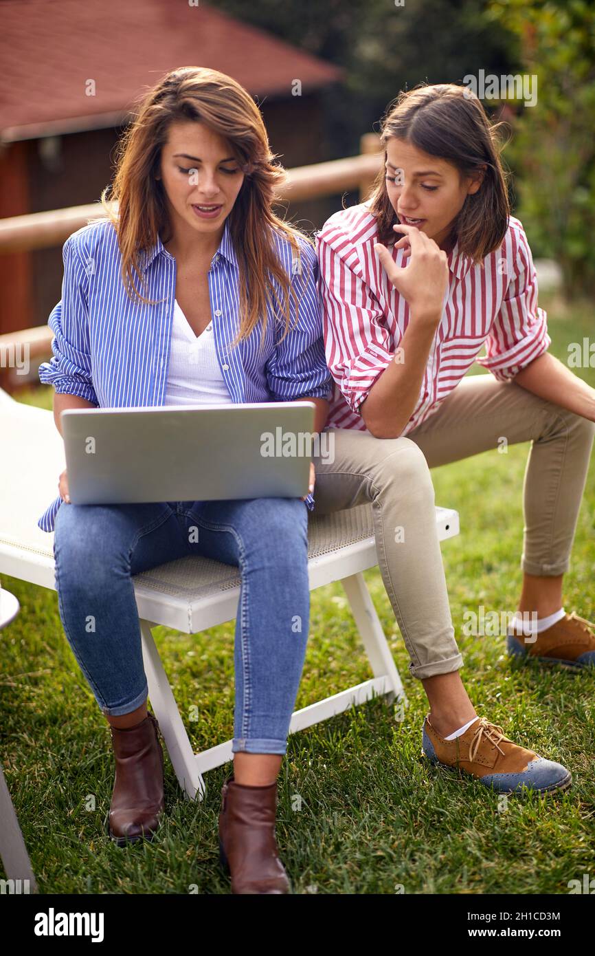 Two students discussion with paper hi-res stock photography and images ...