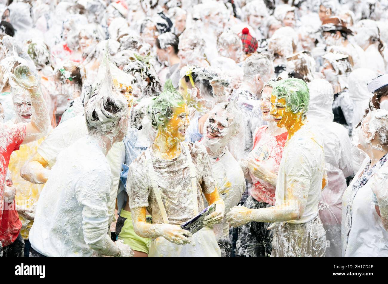 Hundreds of students take part in the traditional Raisin Monday foam ...
