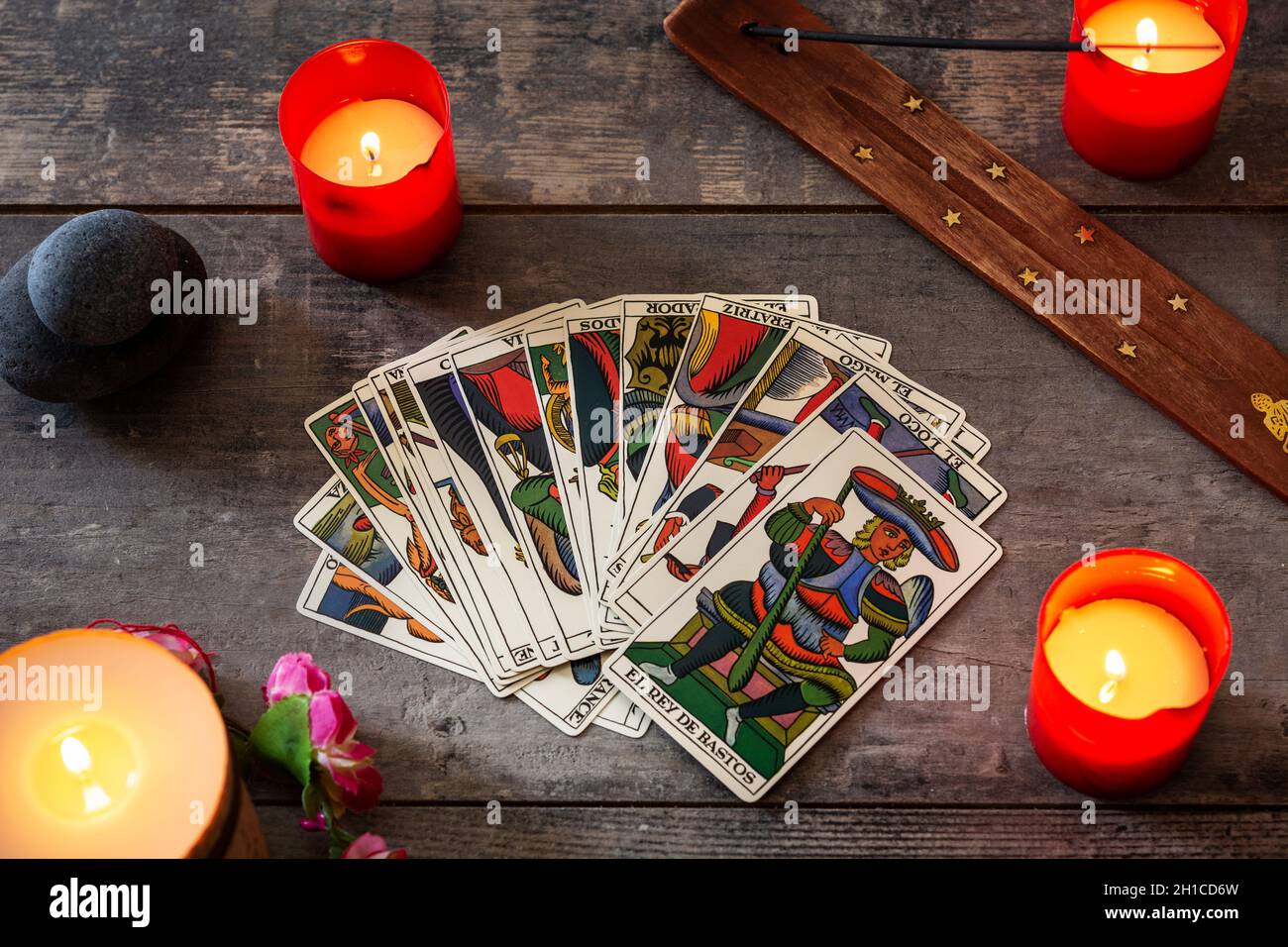 Tarot cards on rustic table Stock Photo - Alamy