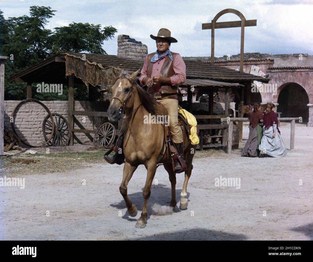 JOHN WAYNE on horseback in THE WAR WAGON 1967 director BURT KENNEDY ...