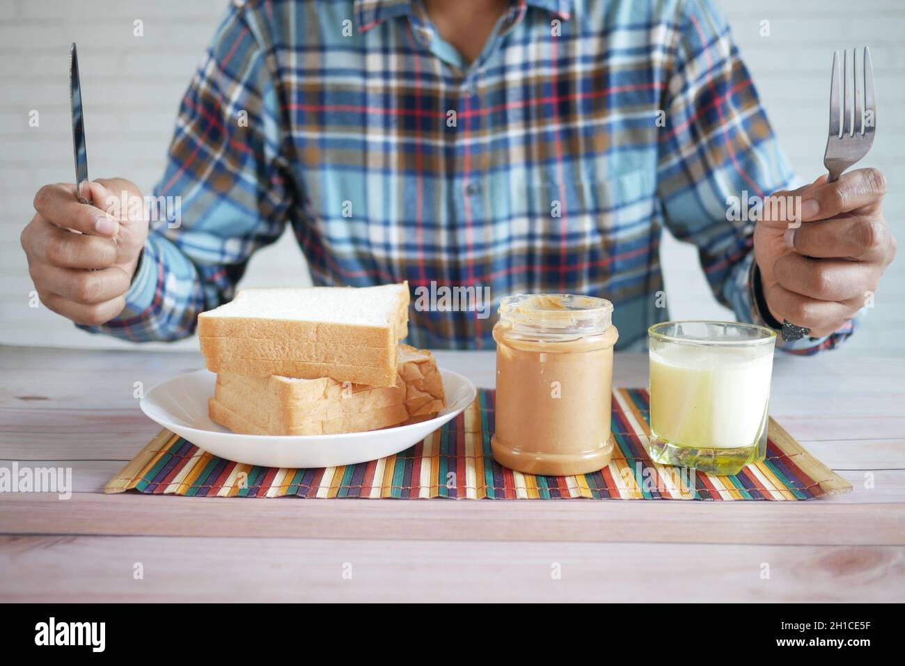 Man eating butter hi-res stock photography and images - Alamy