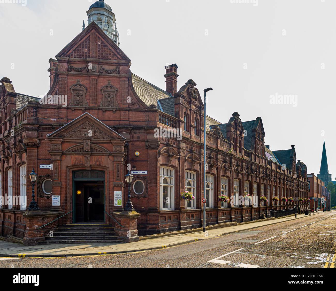 The red brick exterior of Darlington Library situated on the corner of ...