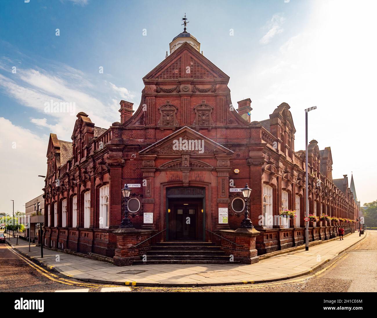 The red brick exterior of Darlington Library situated on the corner of ...