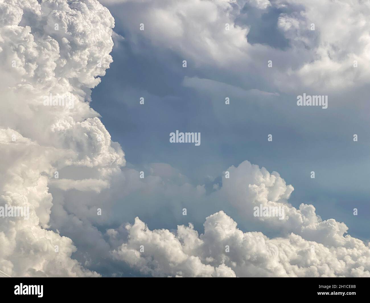 Dense white clouds hi-res stock photography and images - Alamy