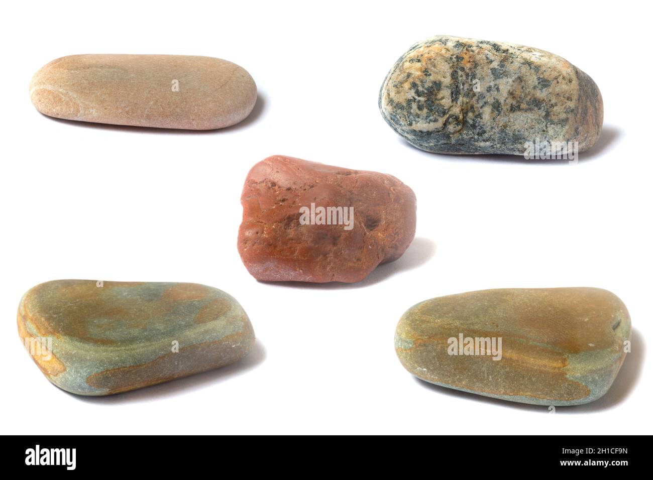 a set of stones with a shadow isolated on a white background. High ...
