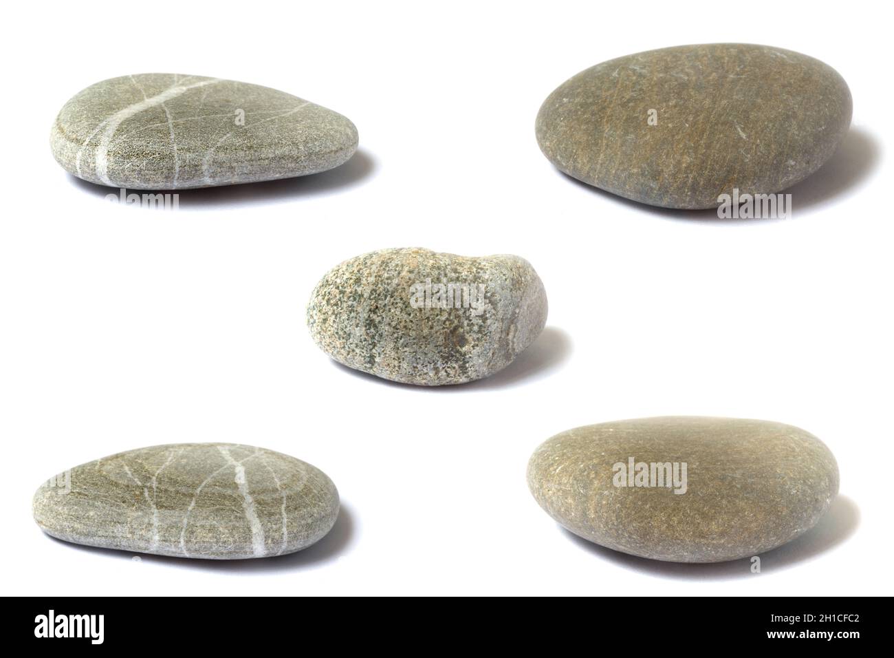 a set of stones with a shadow isolated on a white background. High ...