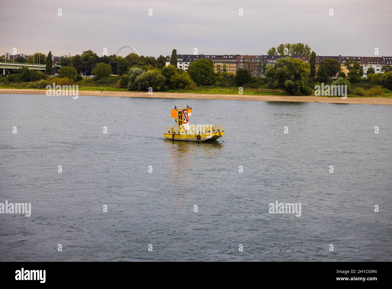 Small boat floating in the river in Cologne, Germany Stock Photo - Alamy