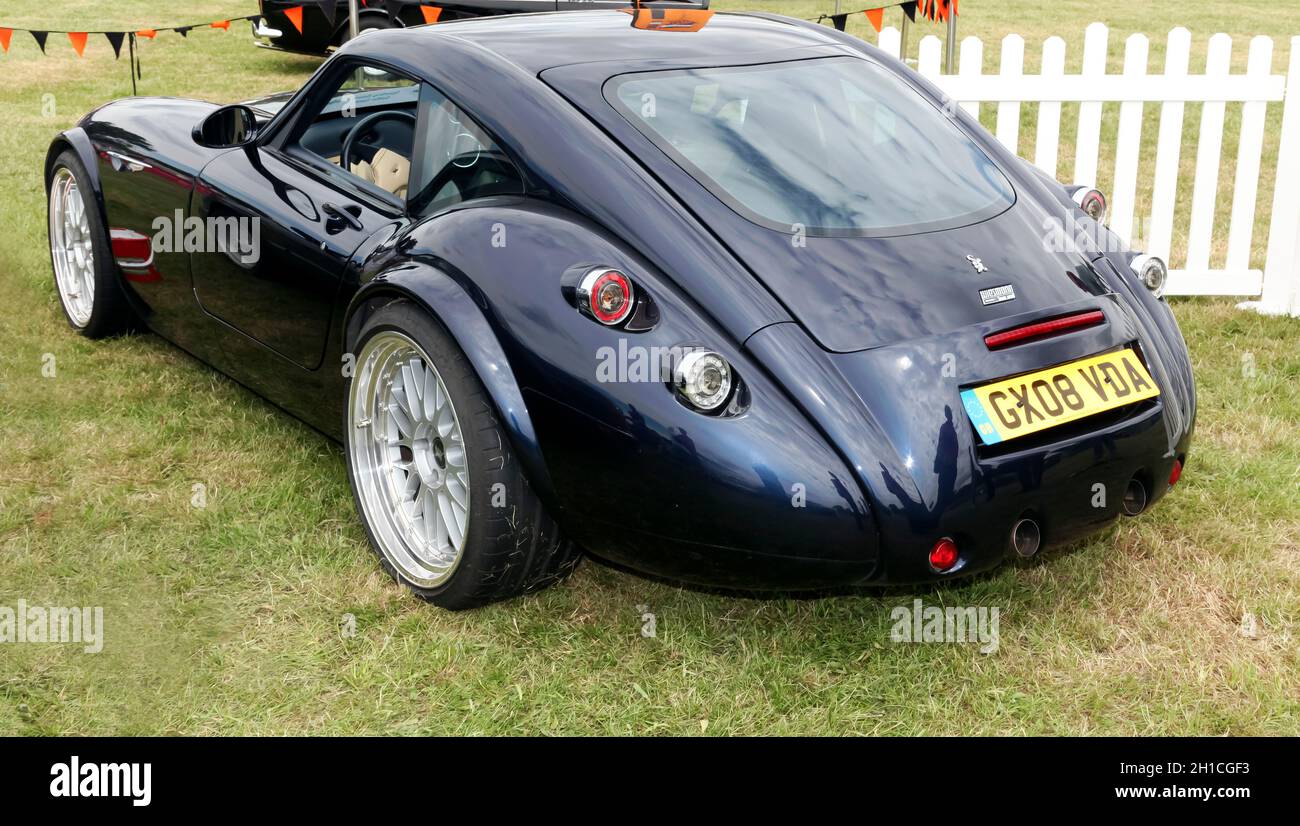 Three-quarters rear view of a Wiesman GT MF4, on display at the 2021 ...