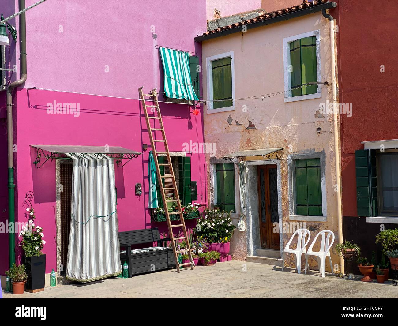 Colorfull painted front houses and Front yard at Brurano Island, Venice ...