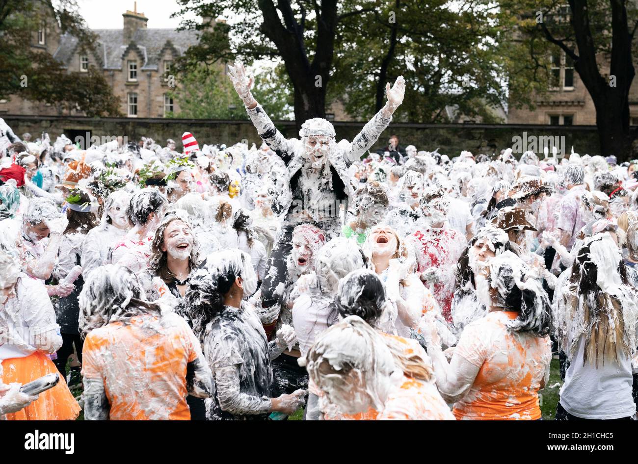 Hundreds of students take part in the traditional Raisin Monday foam ...