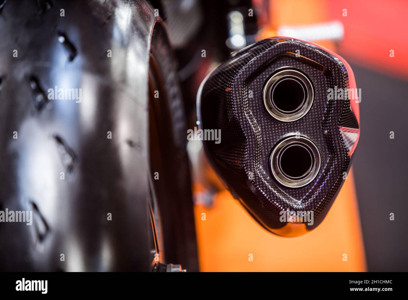 Close up shot of a new motorcycle carbon exhaust pipe Stock Photo - Alamy