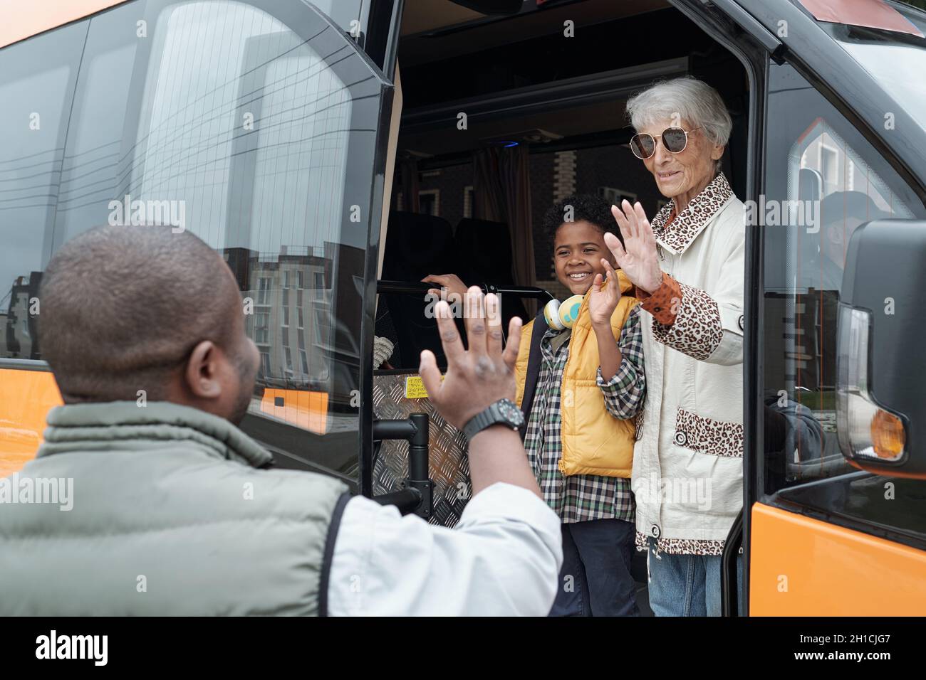African waving goodbye hi-res stock photography and images - Alamy