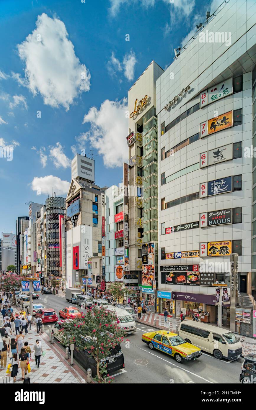 Shopping street leading to Shibuya Crossing Intersection in front of ...