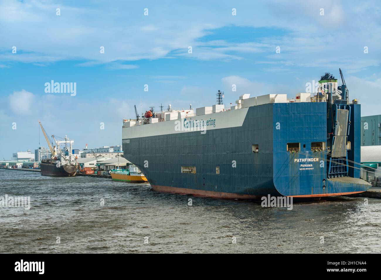 Giant cargo ship with the flag of Panama moored in the commercial port ...
