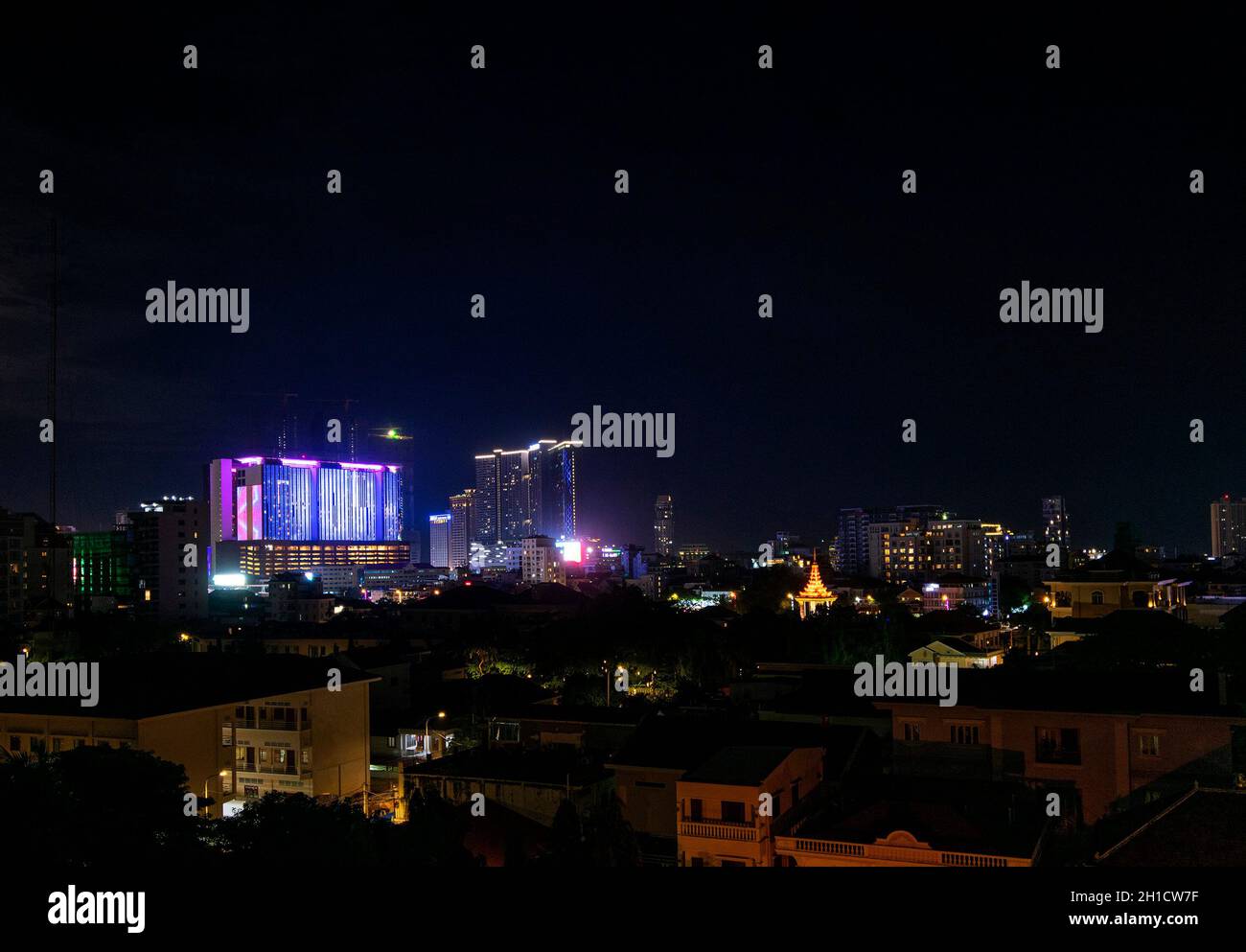 downtown central phnom penh city night view in cambodia with Naga World ...