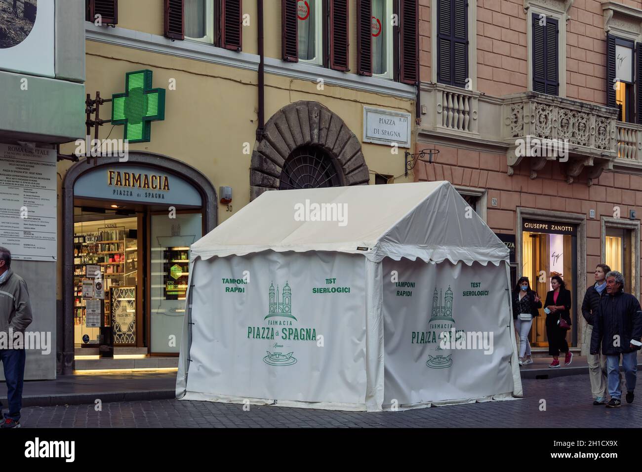 Rome, Italy open pharmacy store entrance with Covid-19 rapid test tent ...