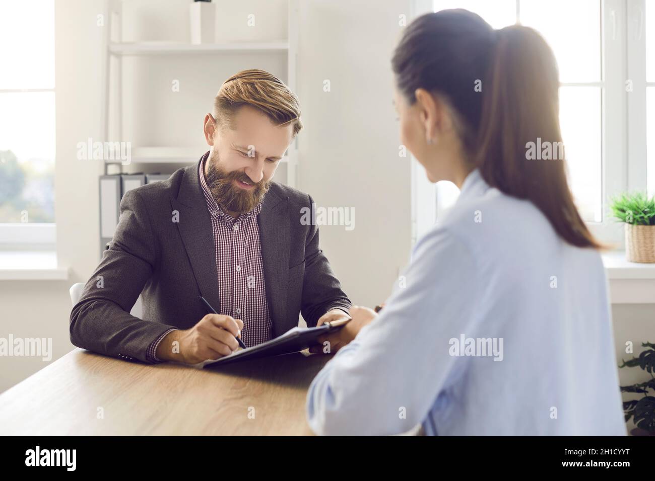 Happy client hi-res stock photography and images - Alamy