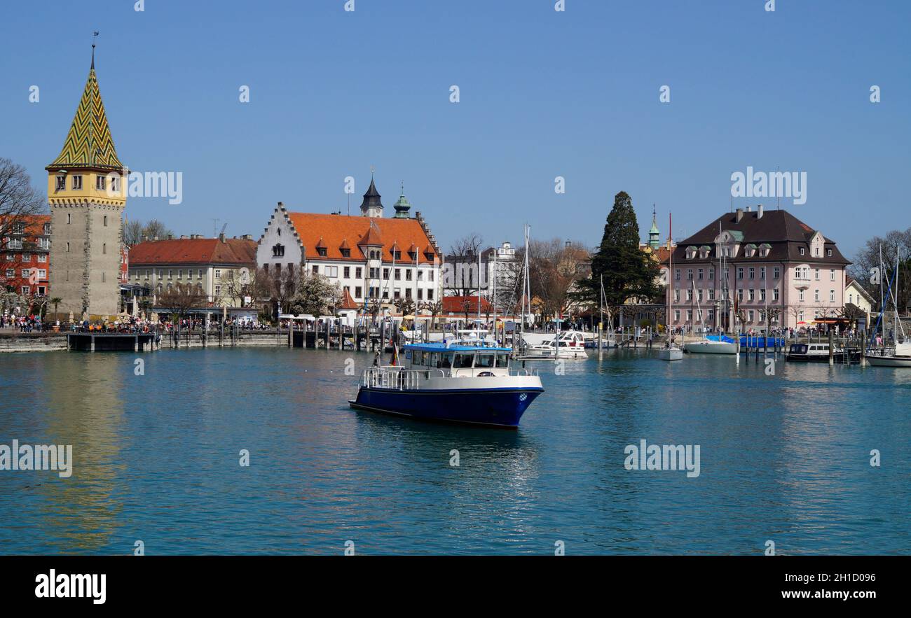 the beautiful harbour of Lindau island on lake Constance in Germany on ...