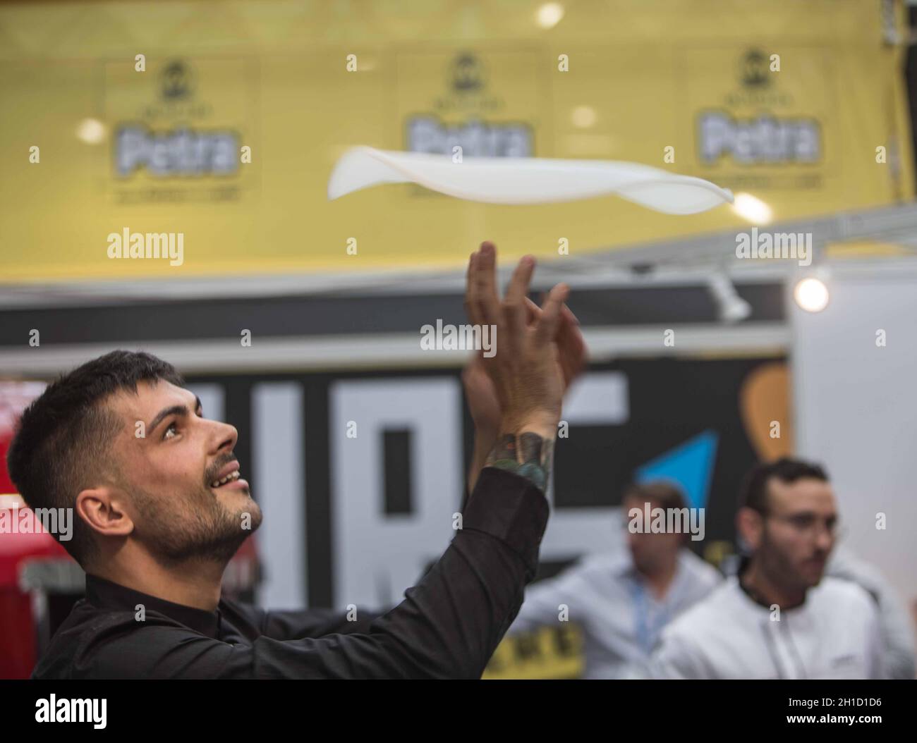 London, UK. 18th Oct, 2021. Spinning dough at the Pizza & Pasta show at ...
