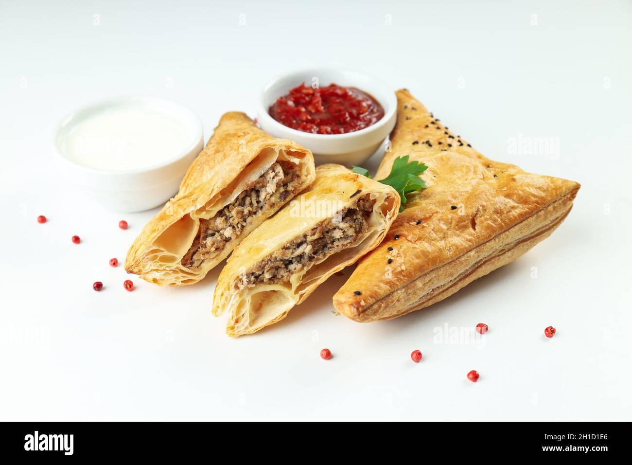 Concept of tasty food with samsa on white background Stock Photo - Alamy