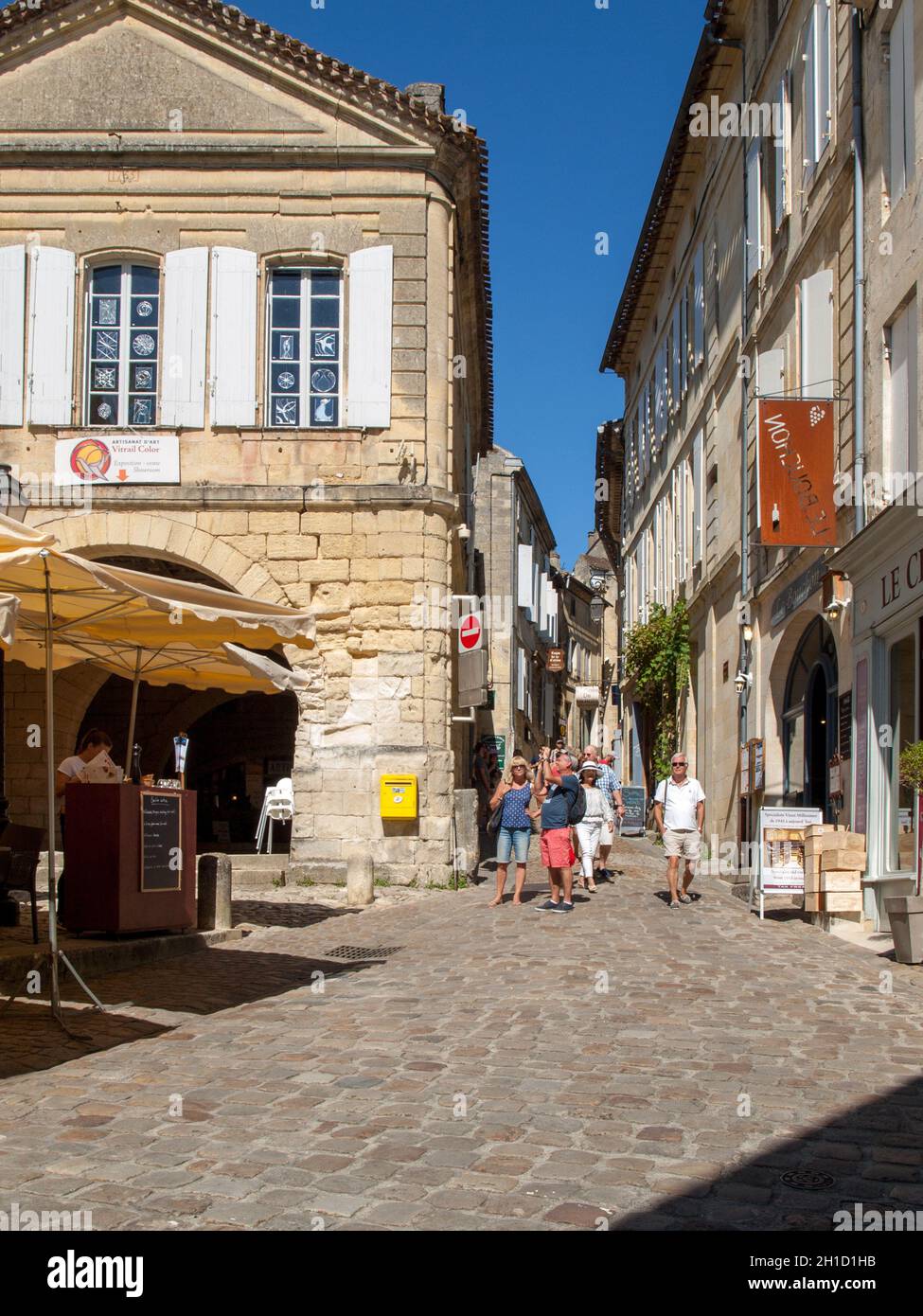 St Emilion, France - September 8, 2018: Tourists in the cobbled streets ...