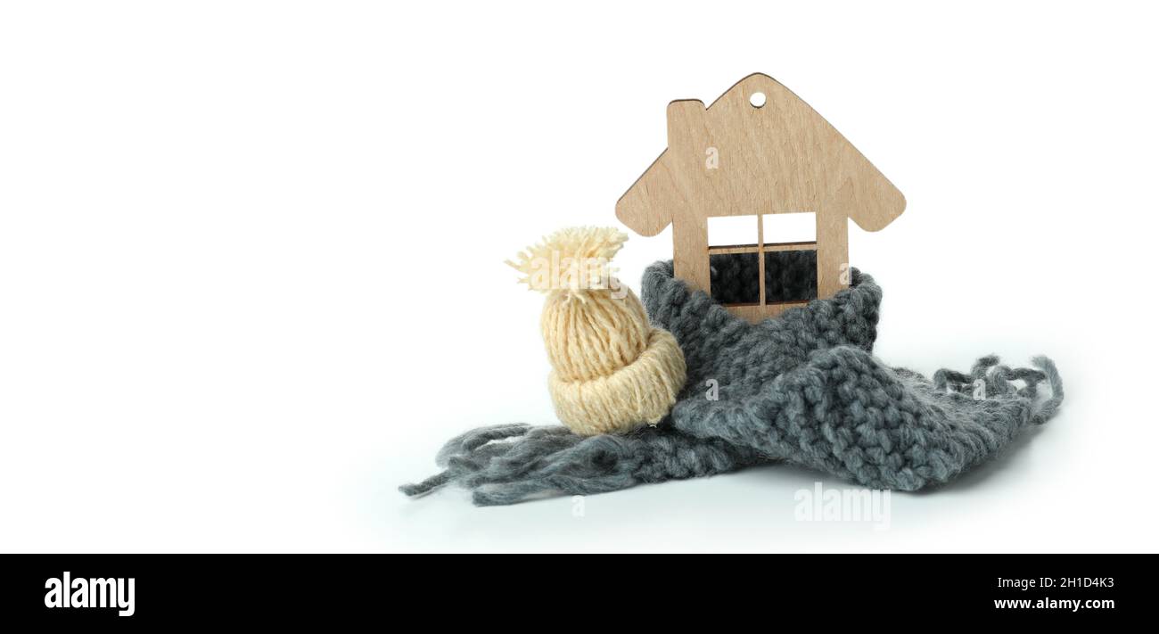 Wooden house with knitted clothes isolated on white background Stock ...