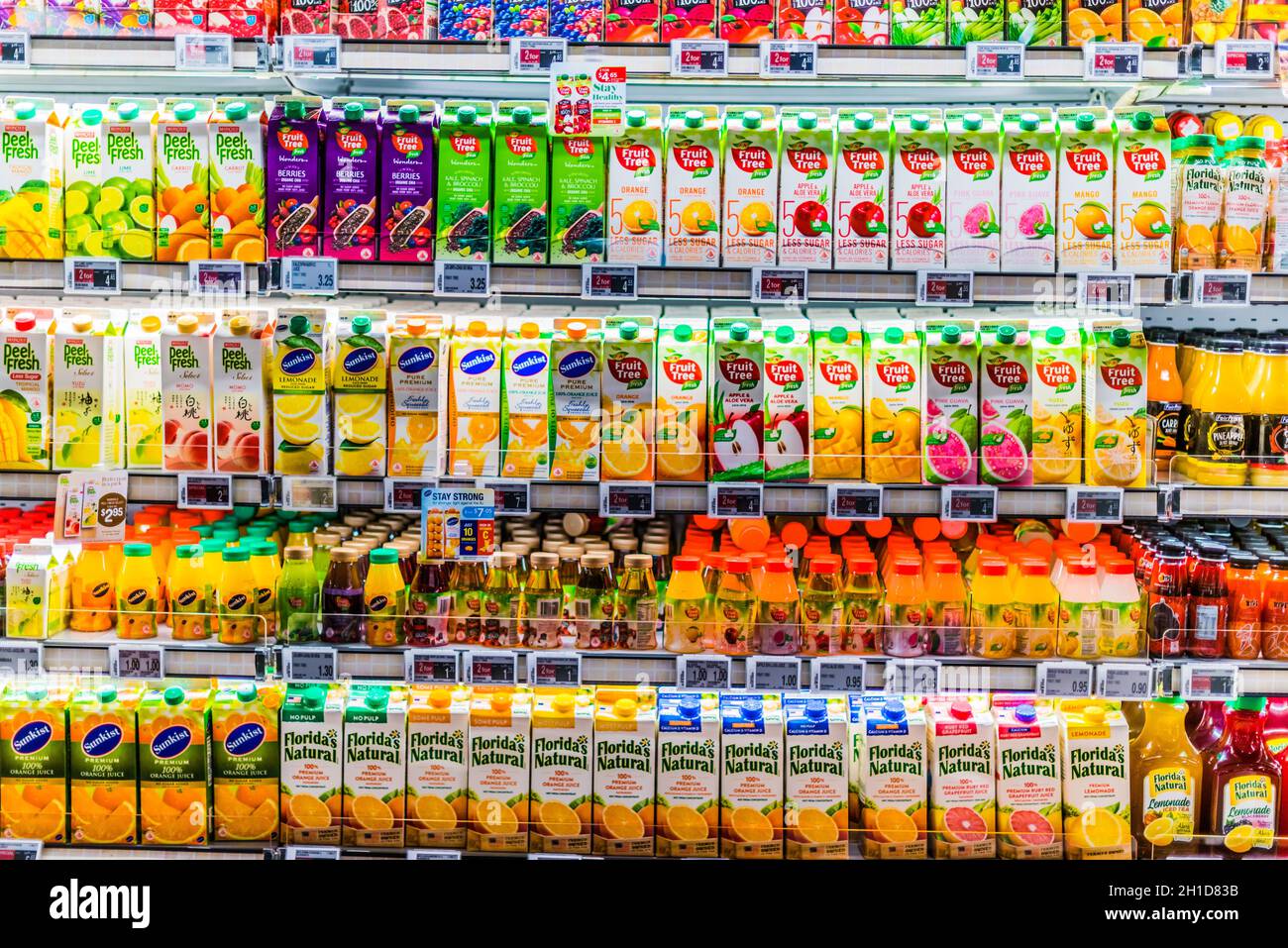 SINGAPORE - MAR 3, 2020: Juice boxes and cold drinks put up for sale in ...