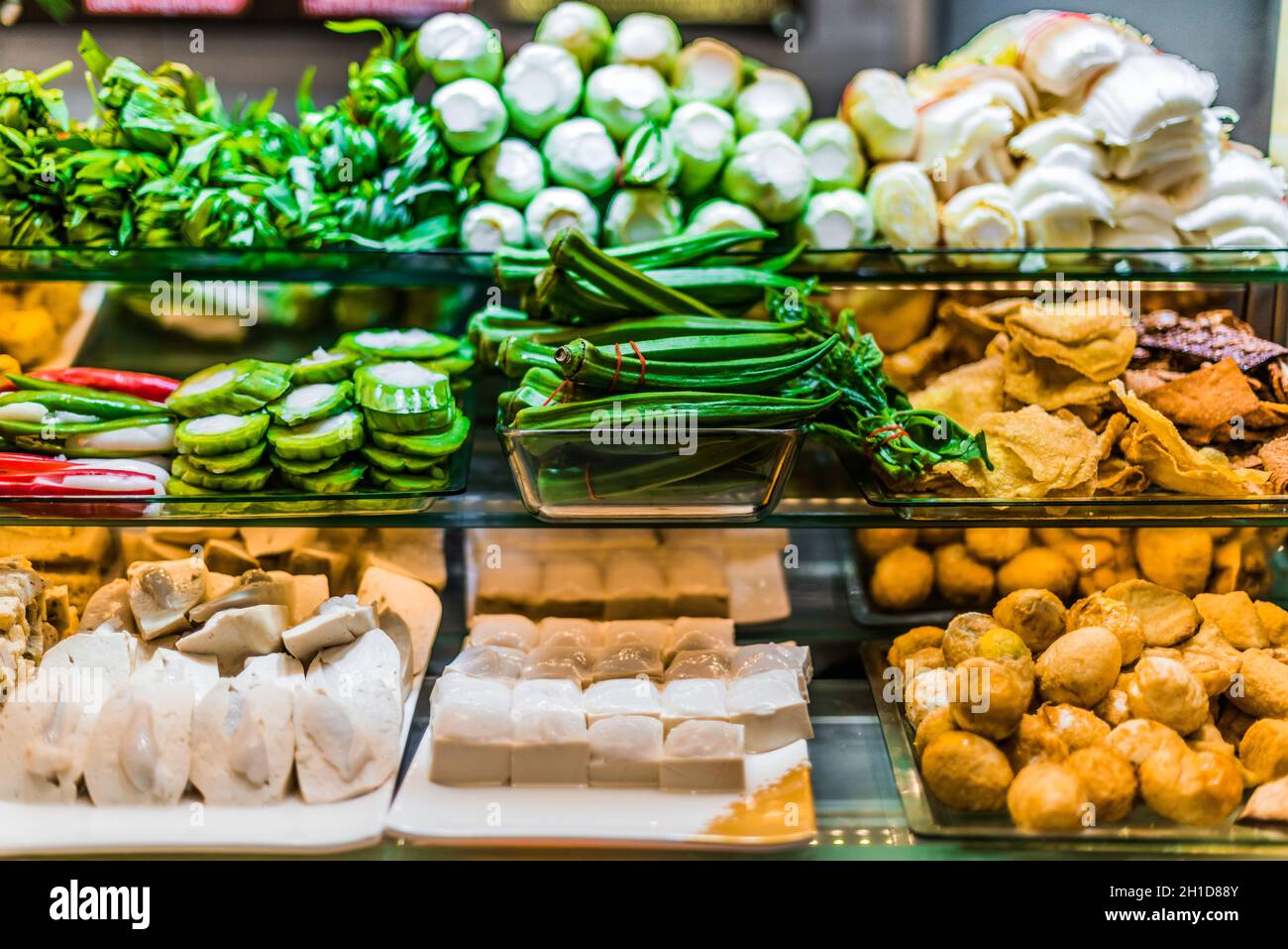 Traditional Asian food ingredients and dishes sold in a Singapore ...