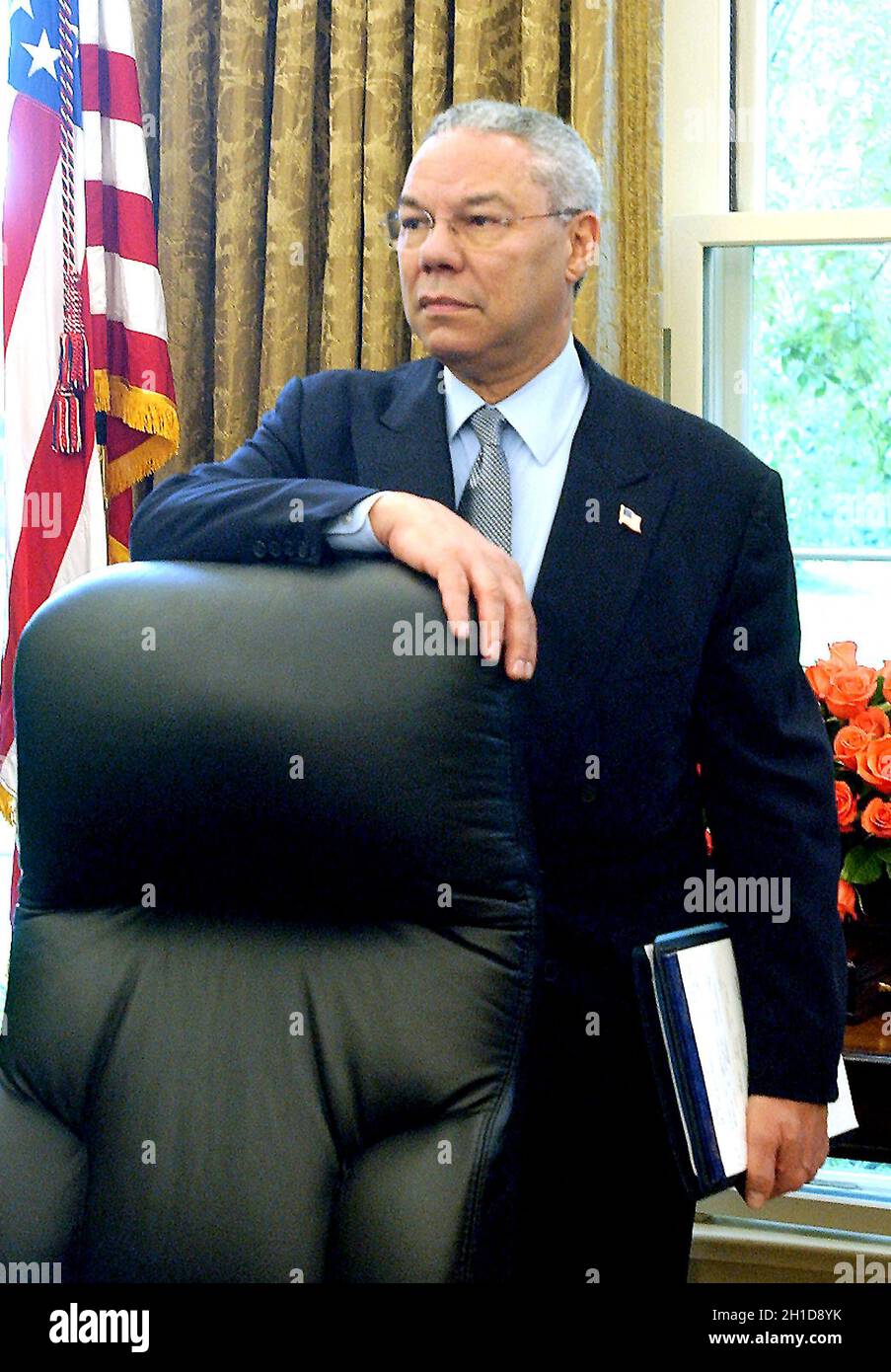 File photo - United States Secretary of State Colin Powell looks on ...
