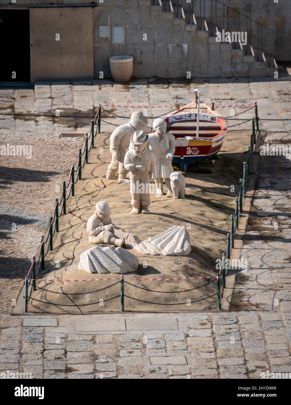 Stone statues of fishermen in Albufeira, Algarve, Portugal Stock Photo ...