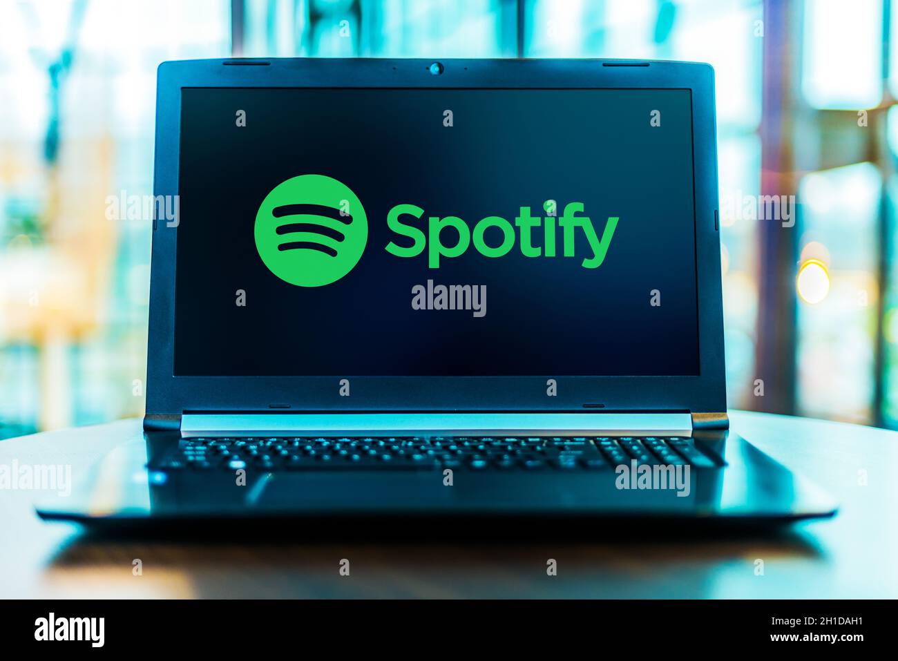 POZNAN, POL - MAR 24, 2020: Laptop computer displaying logo of Spotify, a Swedish audio ...