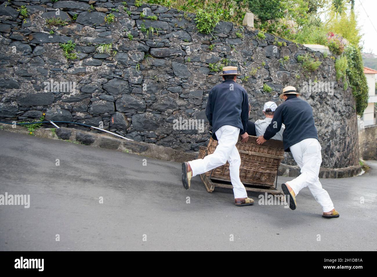 a traditional Monte sledge on the way from Monte to Funchal the city ...