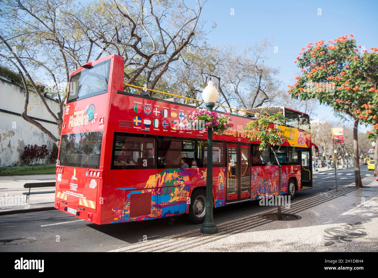 a tour bus in the city centre of Funchal on the Island Madeira of ...