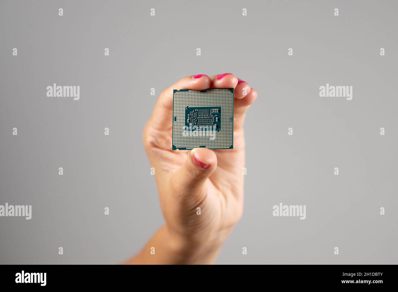 Micro chips hand hi-res stock photography and images - Alamy