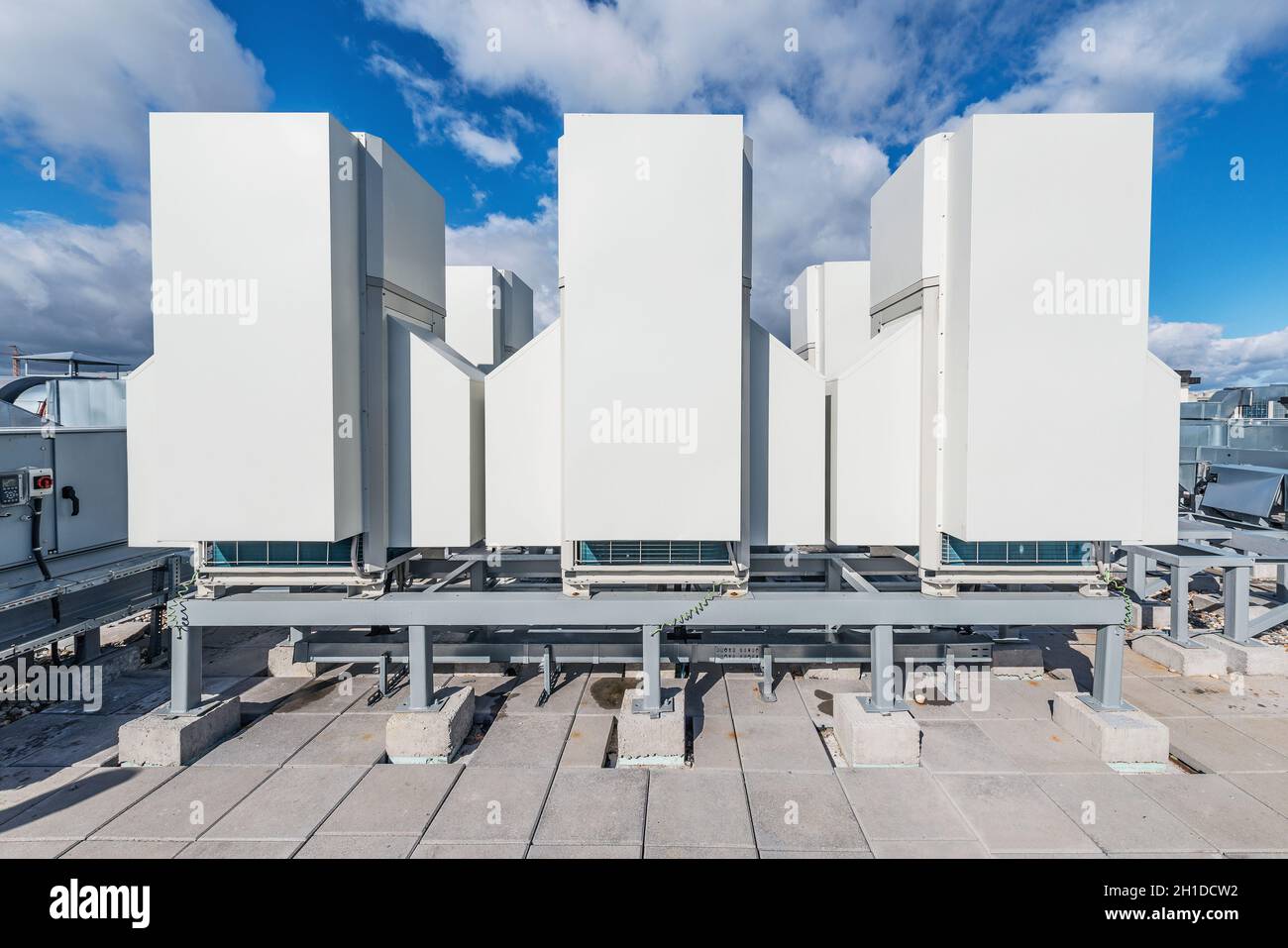 Air conditioning system assembled and installed on top of a building ...
