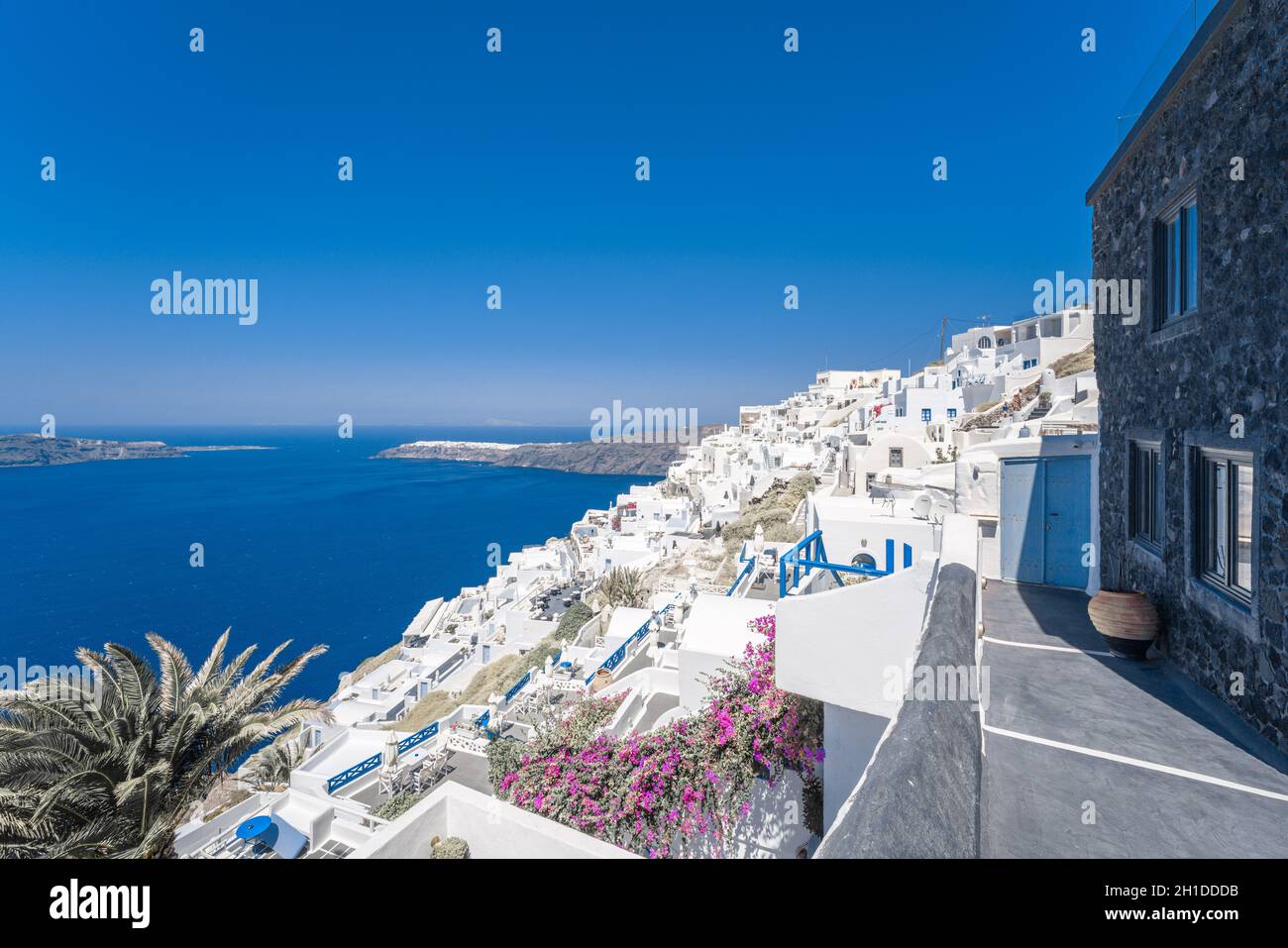 Traditional white buildings and rooftops in the villages of Santorini ...