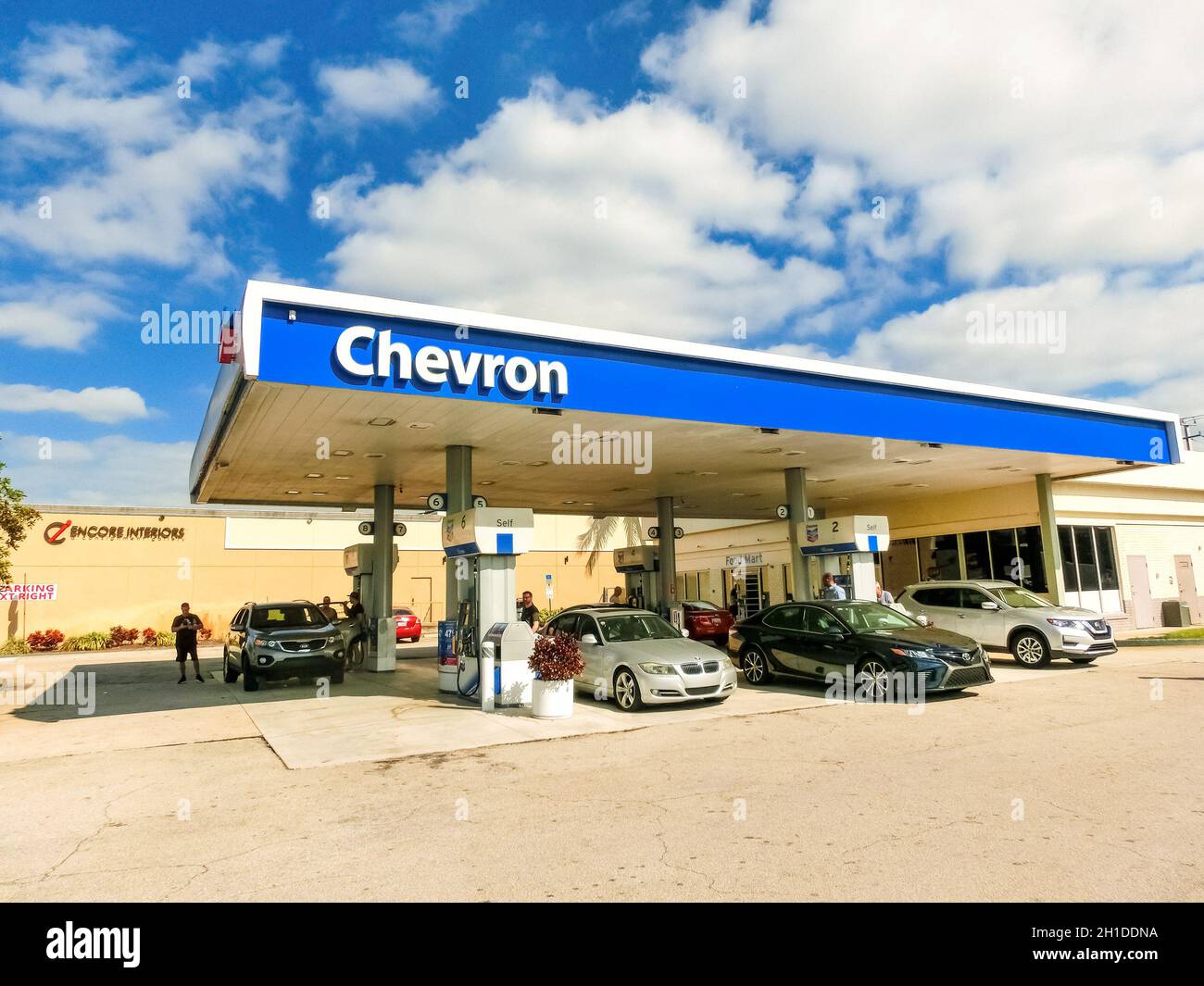 Fort Lauderdale - December 1, 2019: People fill up their cars at ...