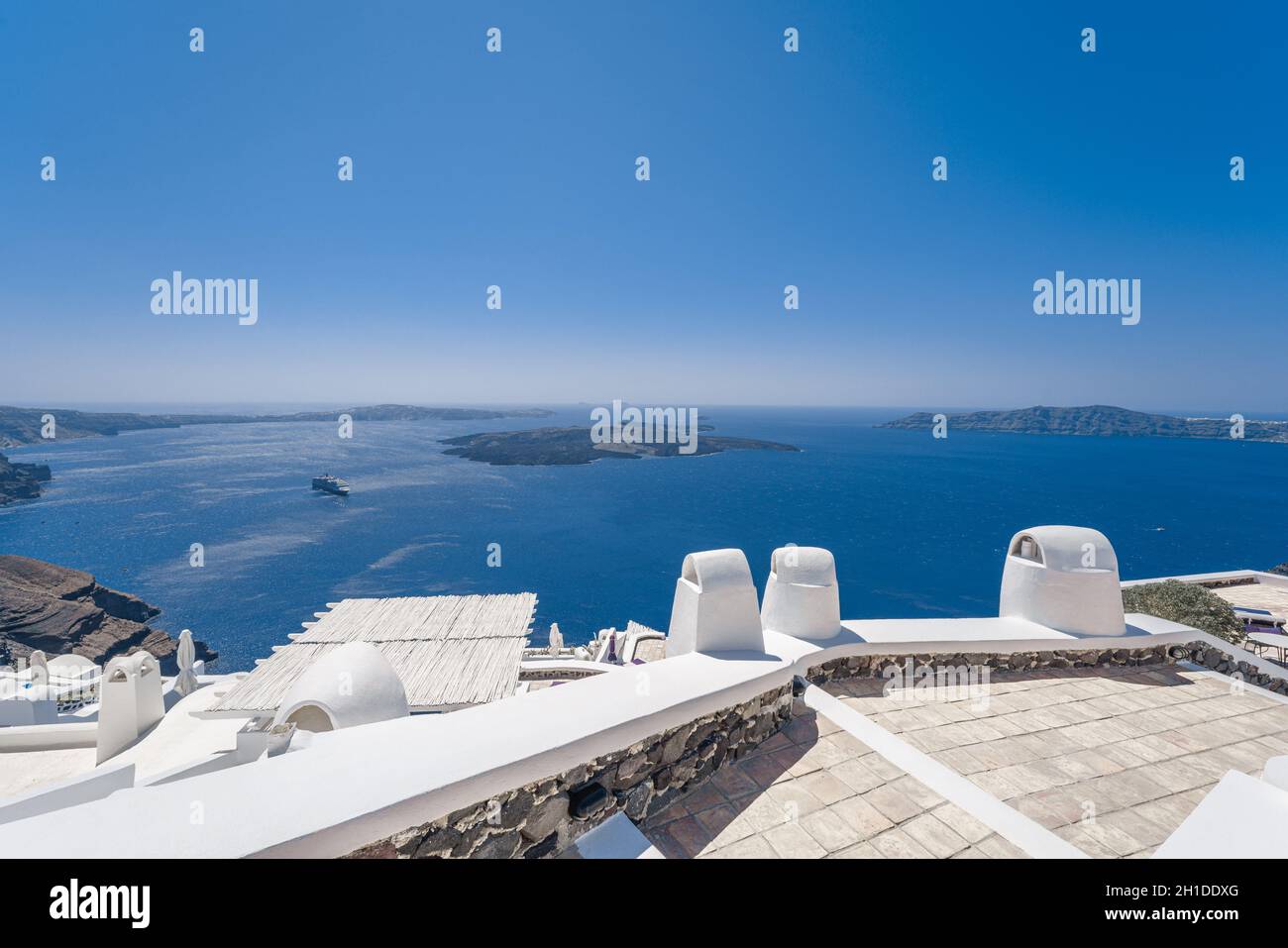 Traditional white buildings and rooftops in the villages of Santorini ...