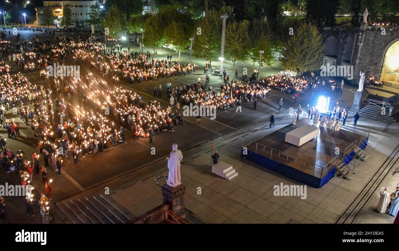 Lourdes, France - 9 Oct 2021: Pilgrims attend the Marian Torchlight ...